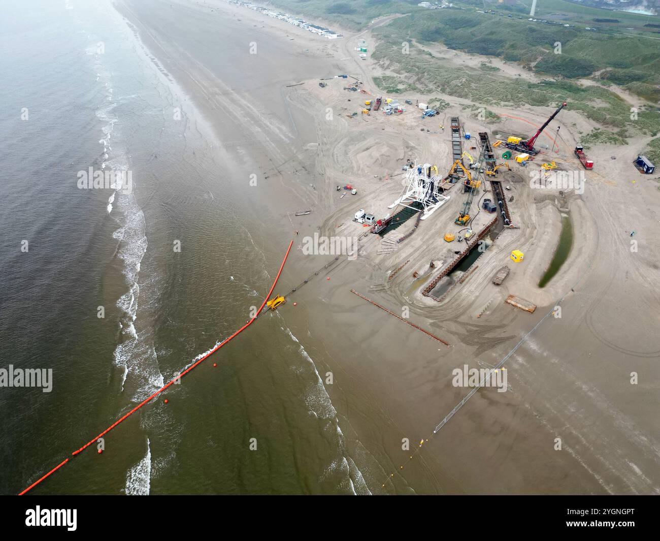 Connecting a seacable from an offshore windpark to an onshore power hub ...