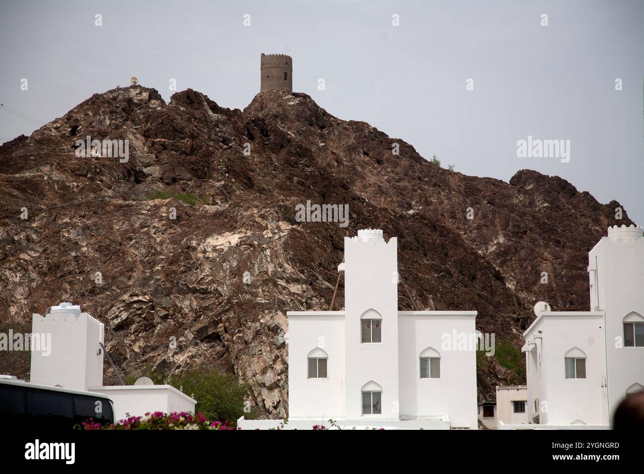watchtower and buildings old muscat oman middle east Stock Photo - Alamy