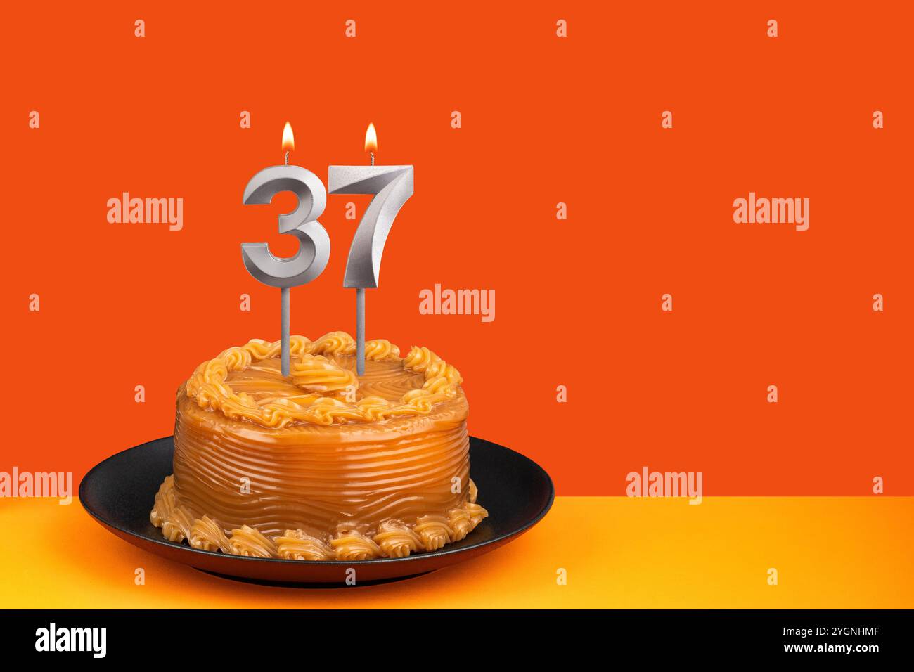 Birthday candle number 37 - Cake with dulce de leche frosting Stock ...