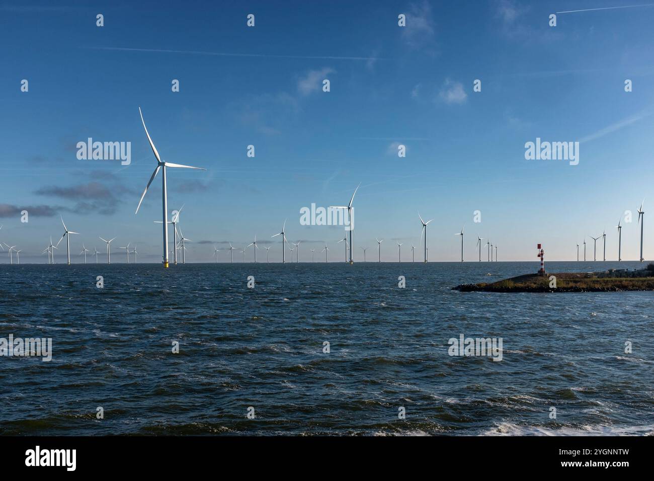 View of wind turbines at the offshore wind farm at Windpark Fryslân, in ...