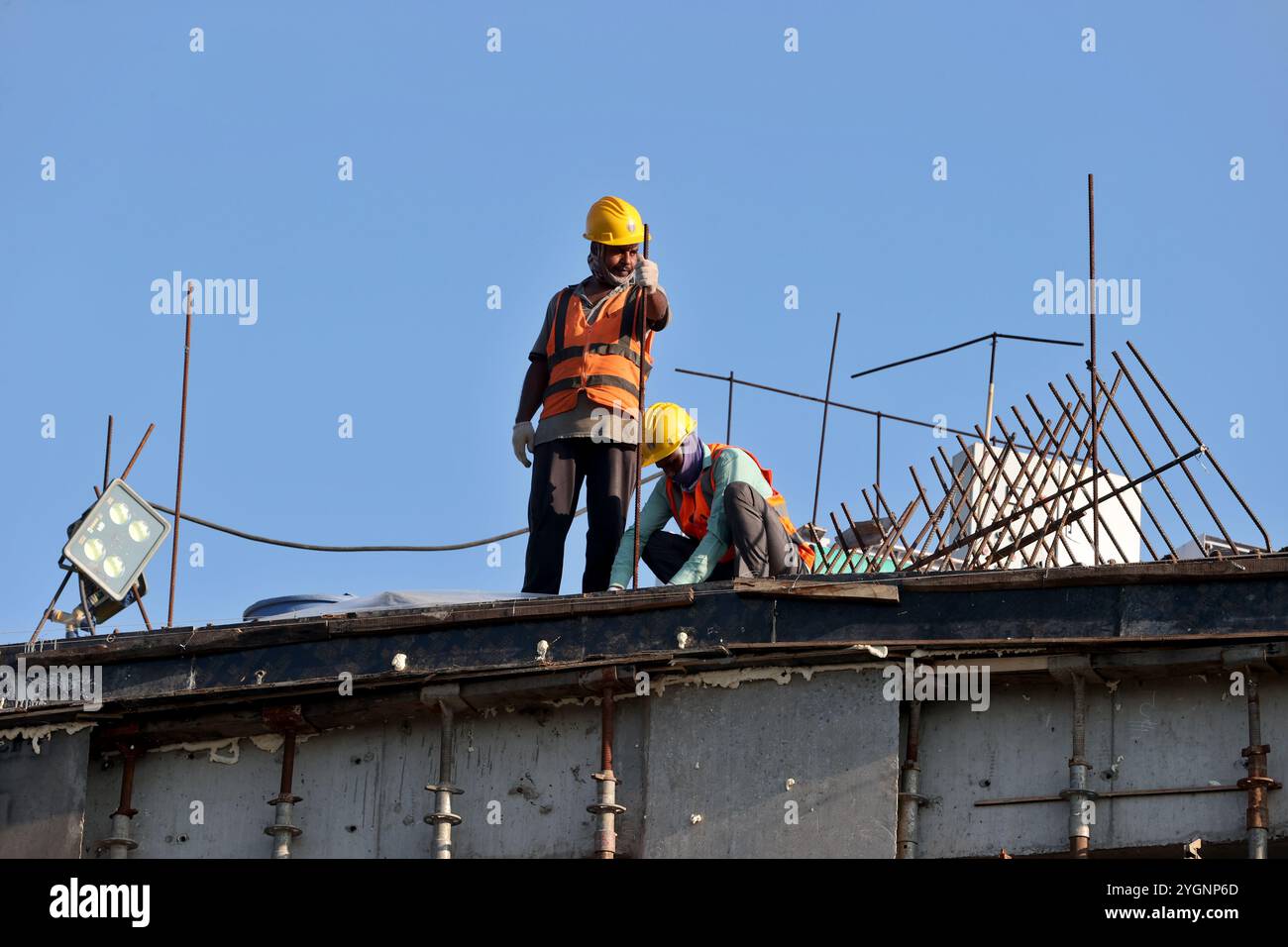 Dhaka, Bangladesh - November 08, 2024: Construction workers are working ...