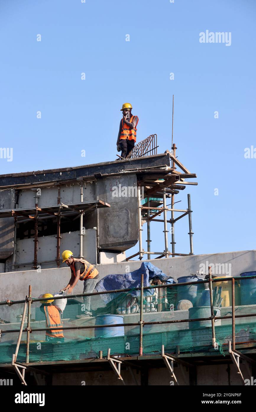 Dhaka, Bangladesh - November 08, 2024: Construction workers are working ...
