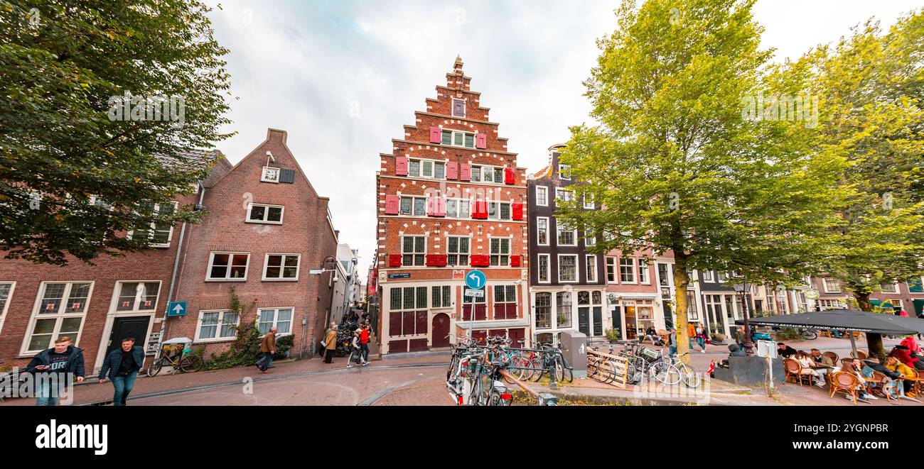 Amsterdam, NL, 10 OCT 2021: Typical Dutch buildings and scenic streets ...