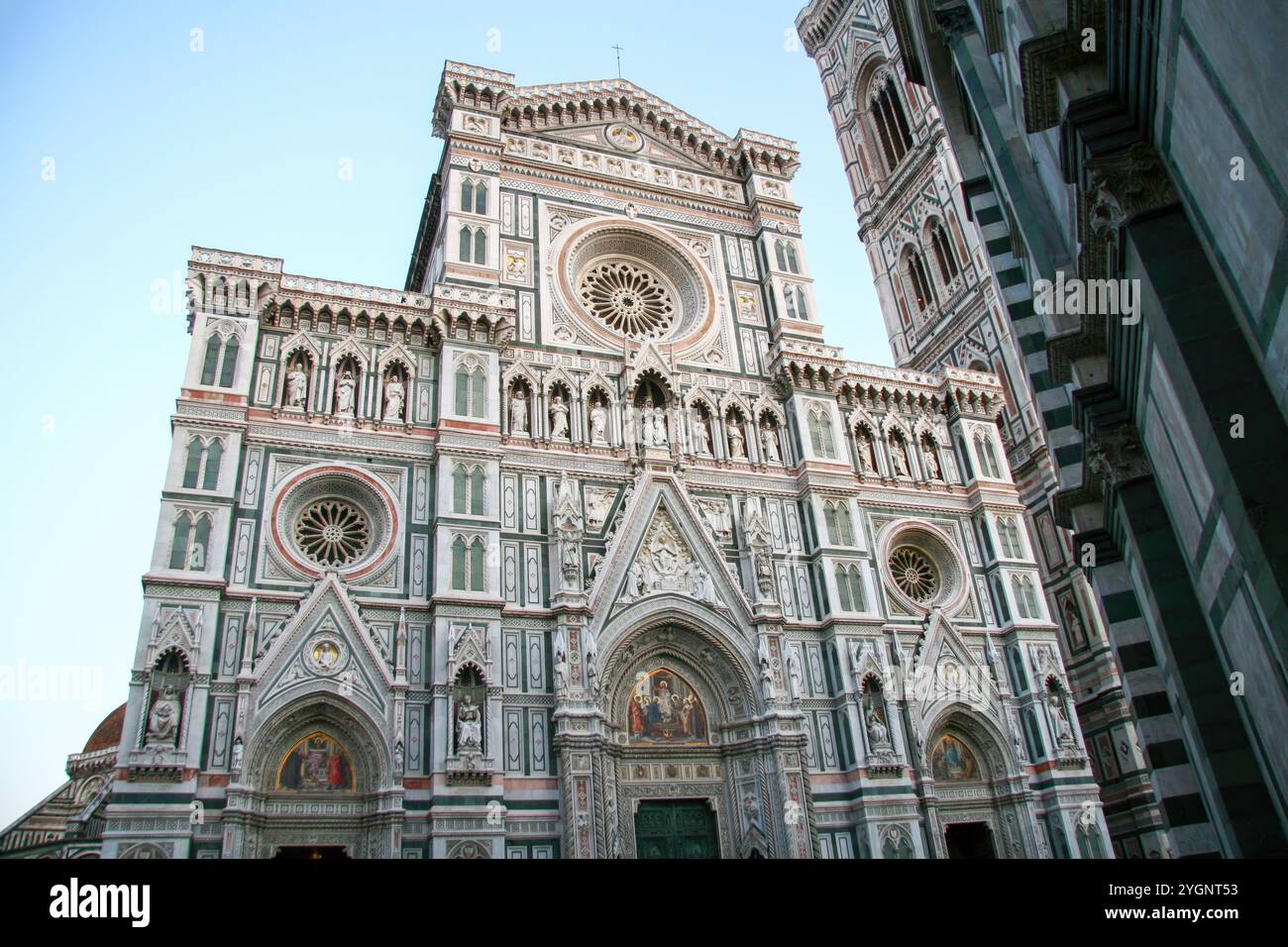Santa maria del fiore cathedral facade with rose window and giotto's ...