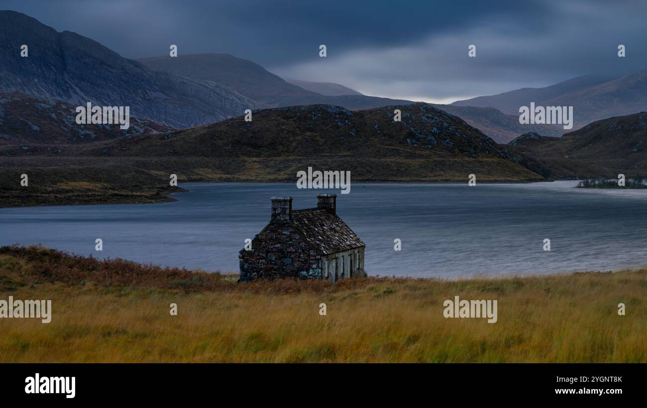 Old cottage on the banks of Loch Stack in The Highlands of Scotland ...