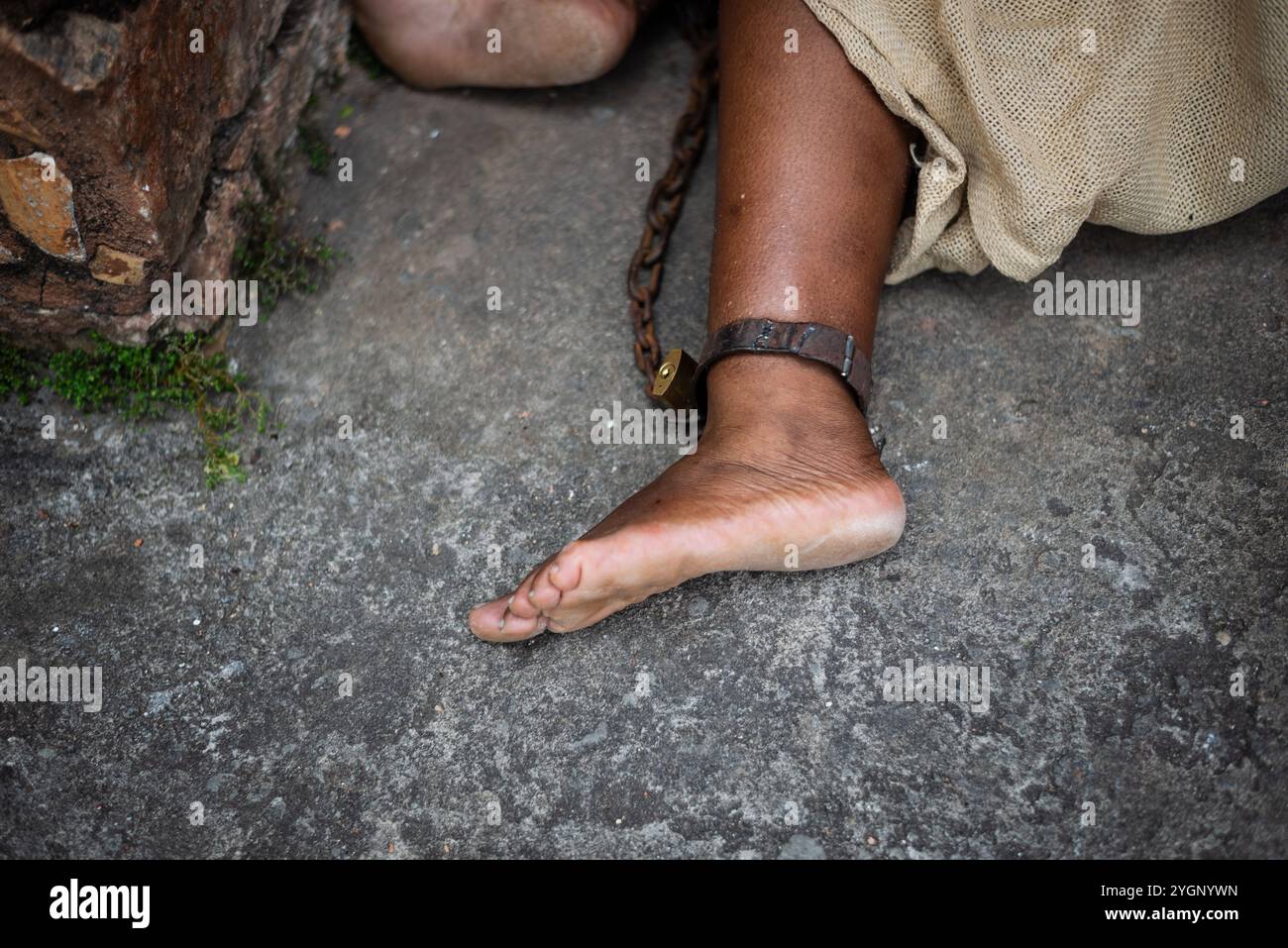 Detail of the chained feet of a black woman in Pelourinho. Slavery in ...