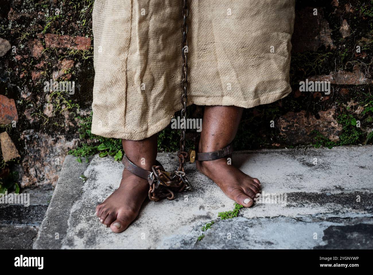 Detail of the chained feet of a black woman in Pelourinho. Slavery in ...