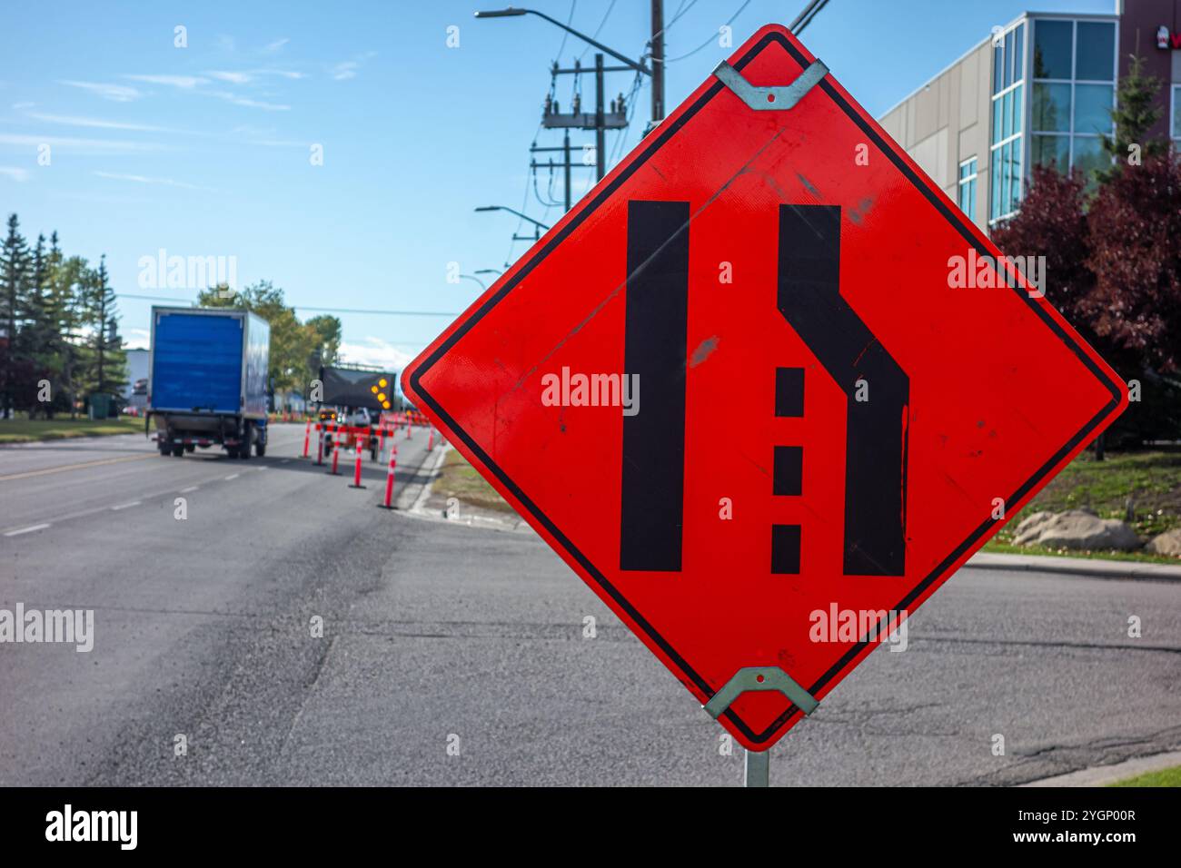 Traffic Merge Sign at a construction site Stock Photo - Alamy