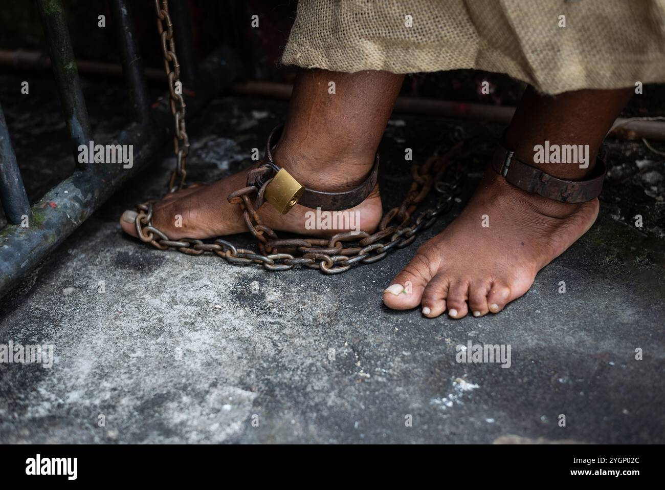 Detail of the chained feet of a black woman in Pelourinho. Slavery in ...