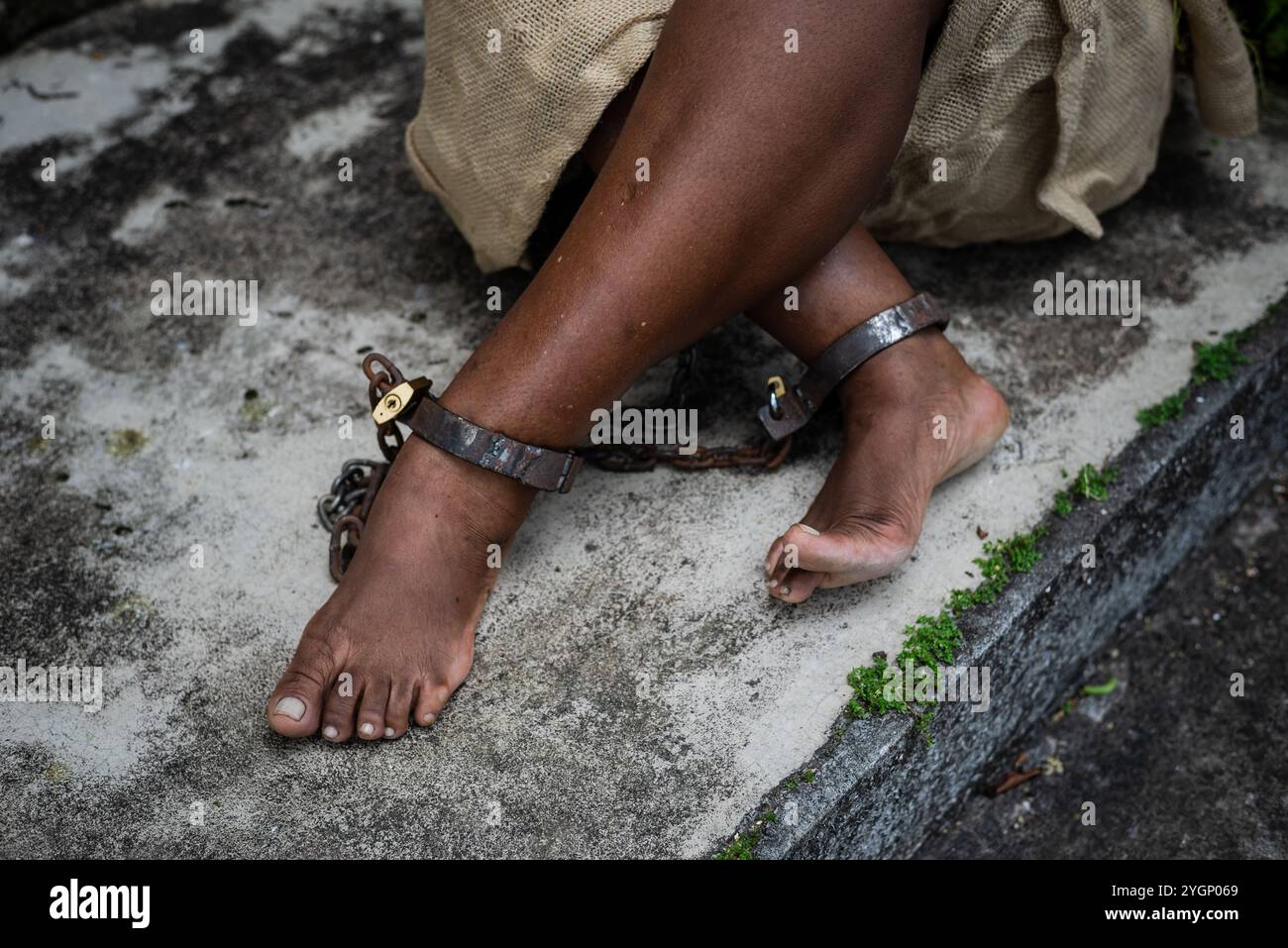 Detail of the chained feet of a black woman in Pelourinho. Slavery in ...