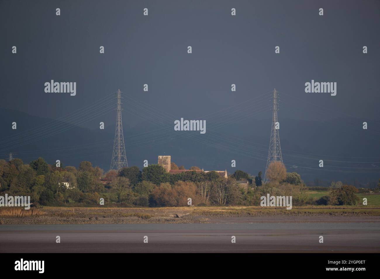 Jumbo electricity pylons span the River Severn at Awre. The River ...