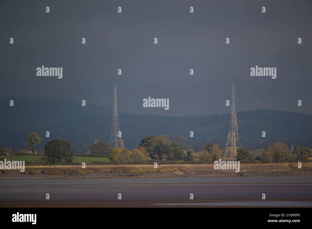 Jumbo electricity pylons span the River Severn at Awre. The River ...