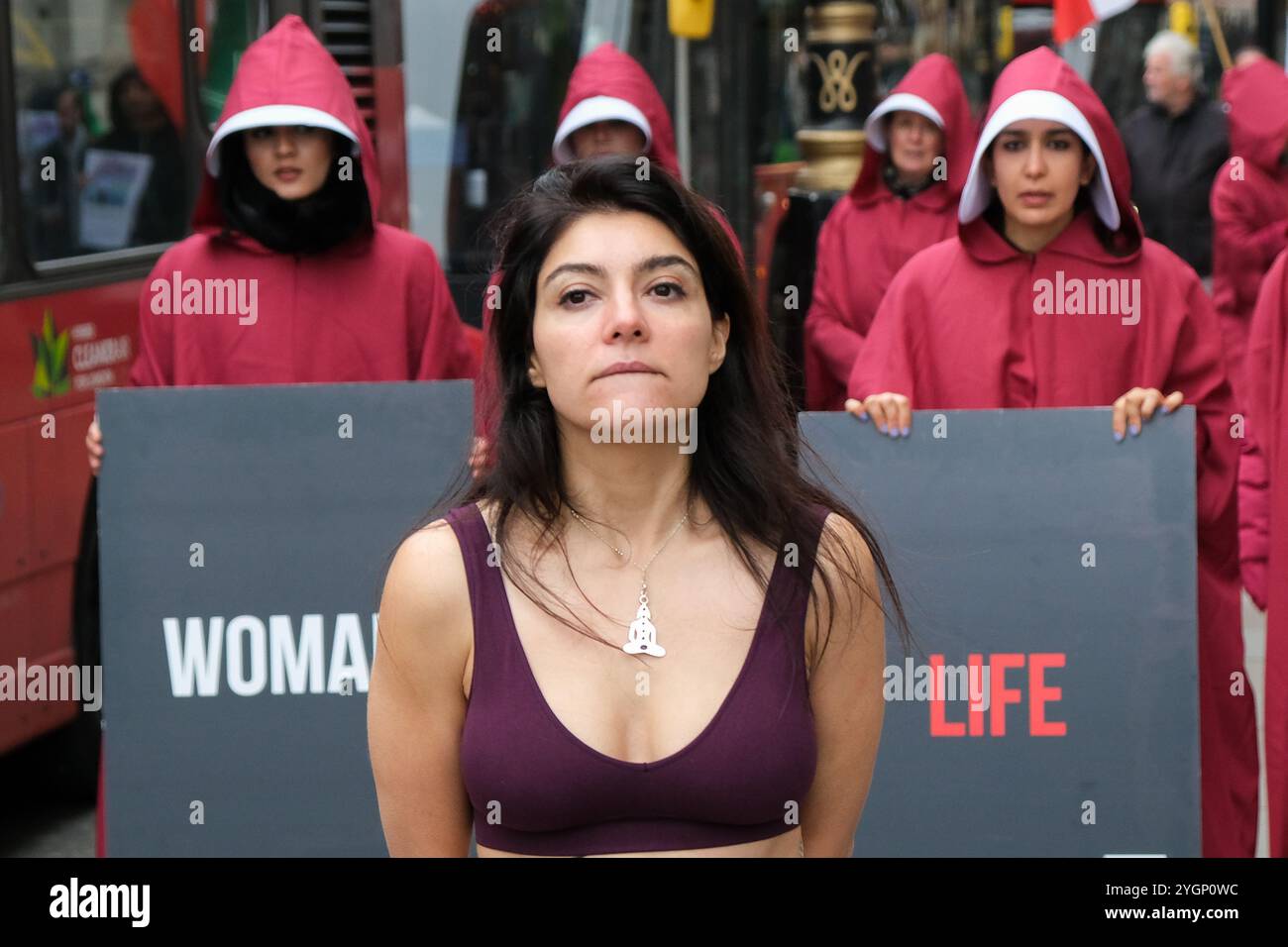 London, UK. 8th November, 2024. Protesters dressed in Handmaid's Tale ...