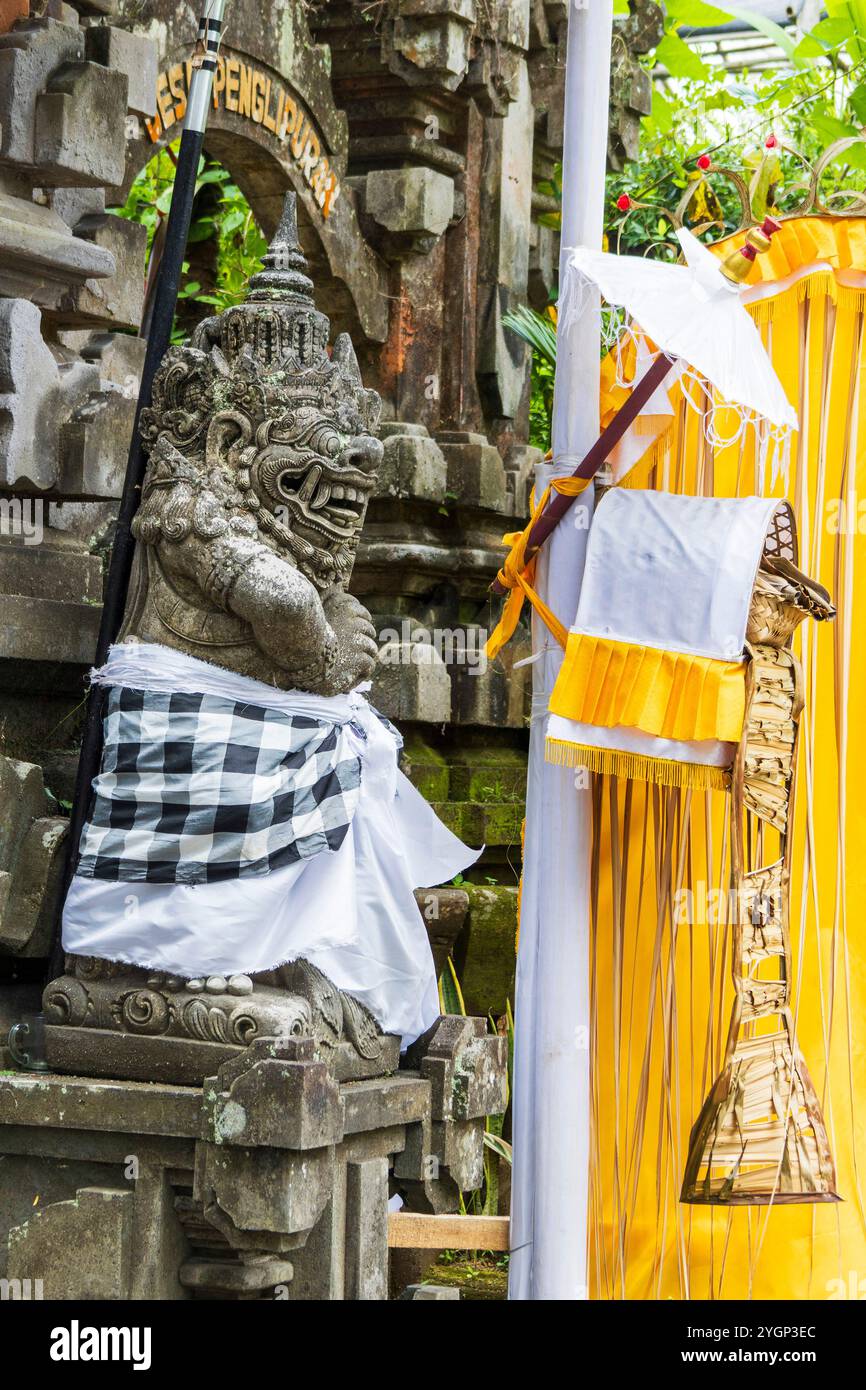 Statues in the traditional Balinese village of Penglipuran, Bangli ...