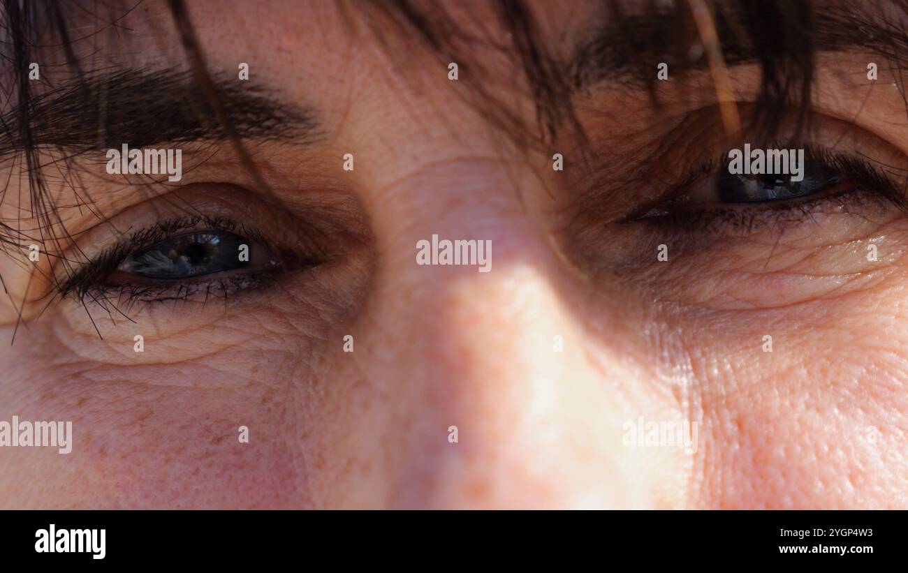 Tired blue eyes female blinking hi-res stock photography and images - Alamy