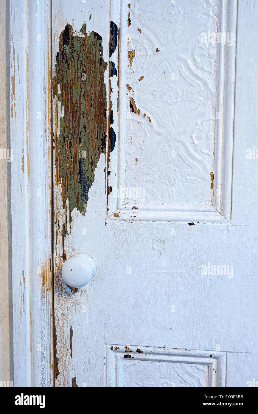 Scratch damage to an old internal door caused by a large dog Stock ...