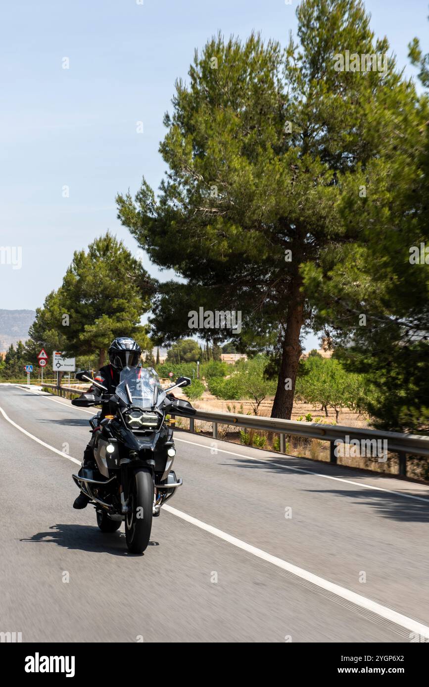 Riding a motorcycle on a highway Stock Photo - Alamy
