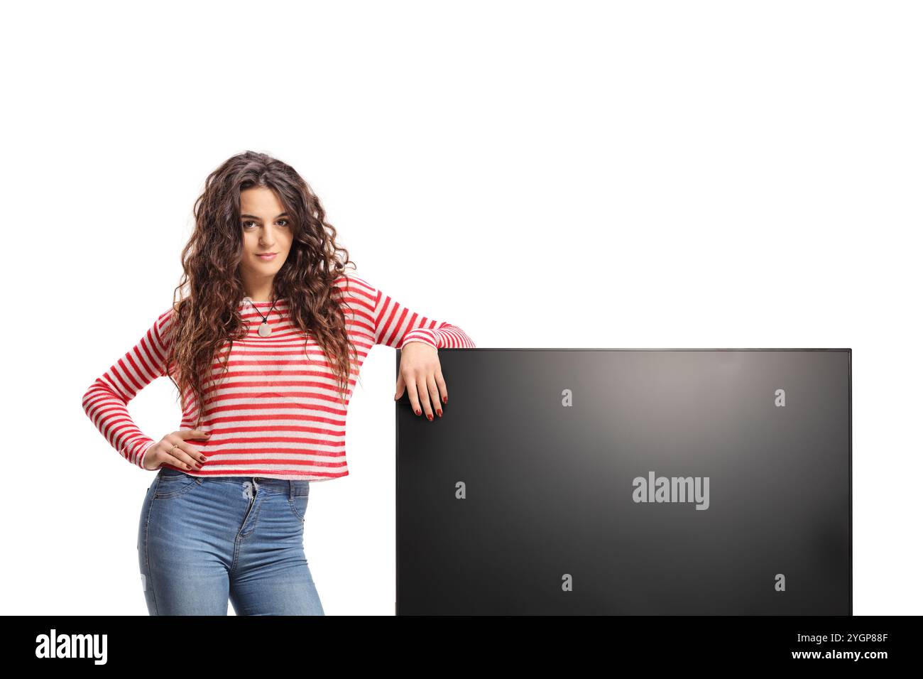 Young woman with a flat tv screen isolated on white background Stock ...