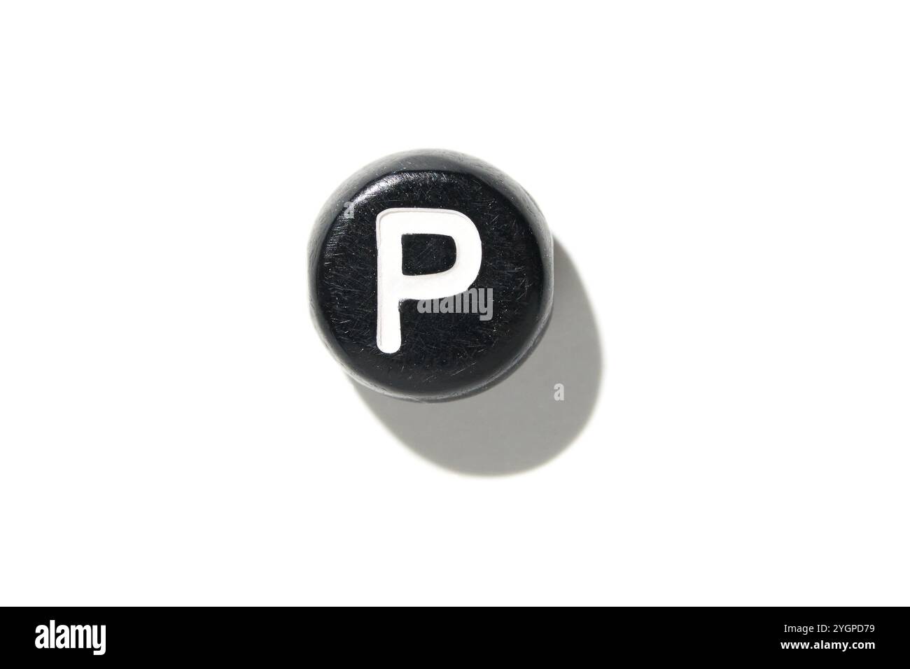 Black button with white letter p isolated on white background with ...