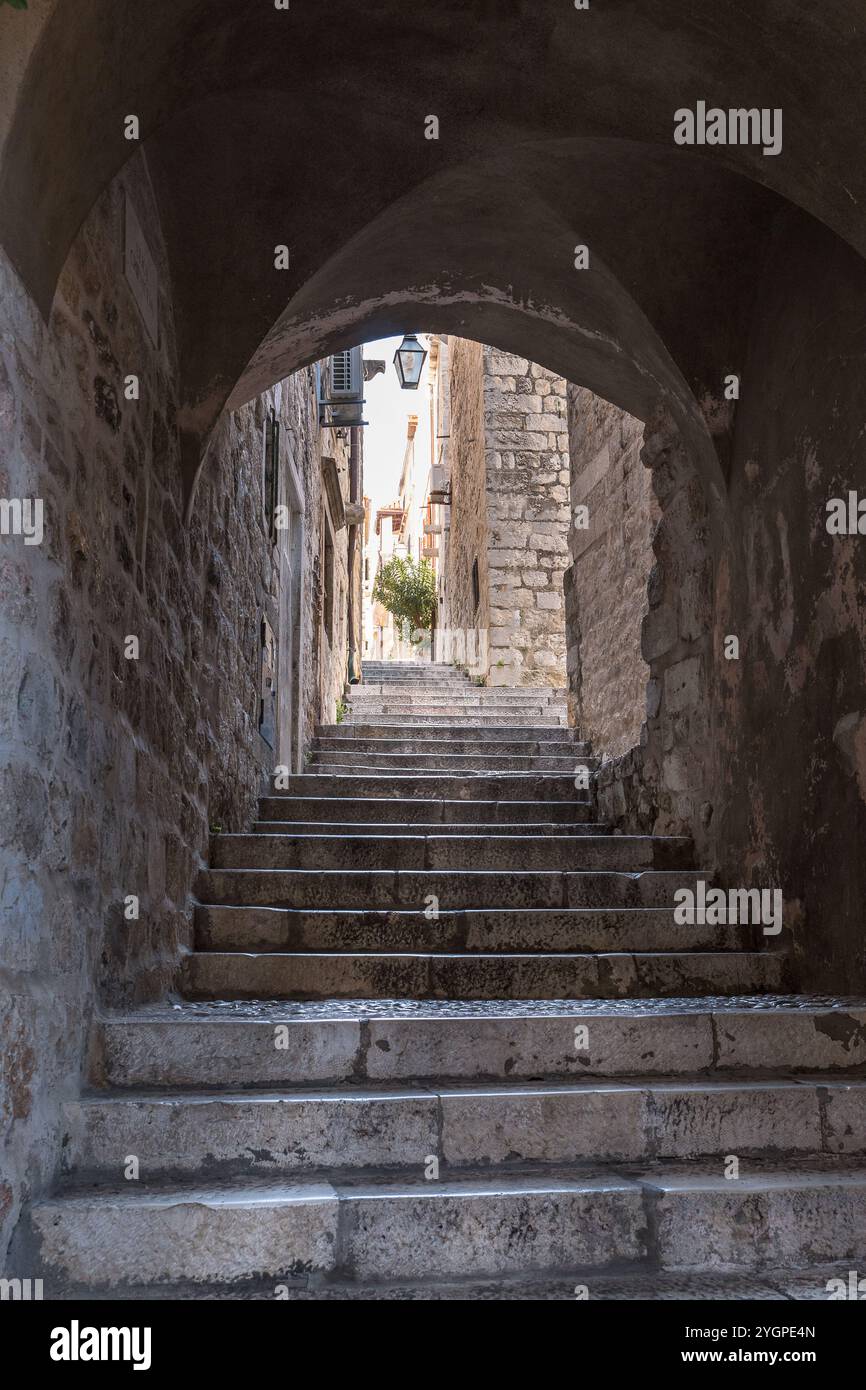 Arched Medieval Street and stone staircase Stock Photo - Alamy