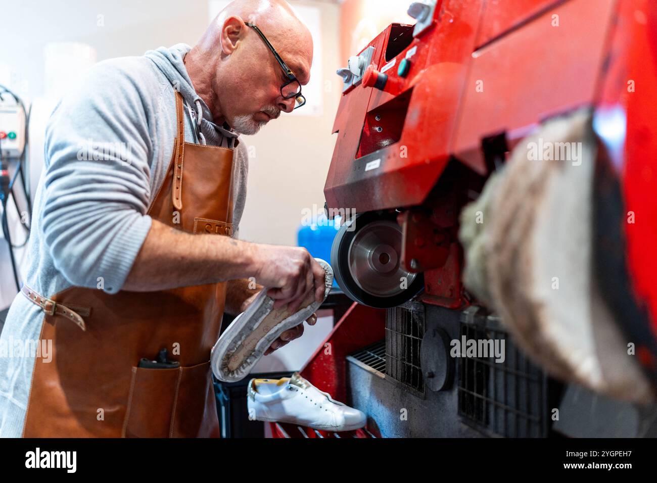 Paris, France. 08th Nov, 2024. Illustration of a Shoemaker repairing ...