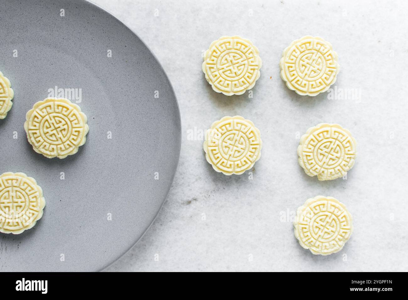 Overhead view of tuwon madara dough on parchment paper, nigerian alawar ...