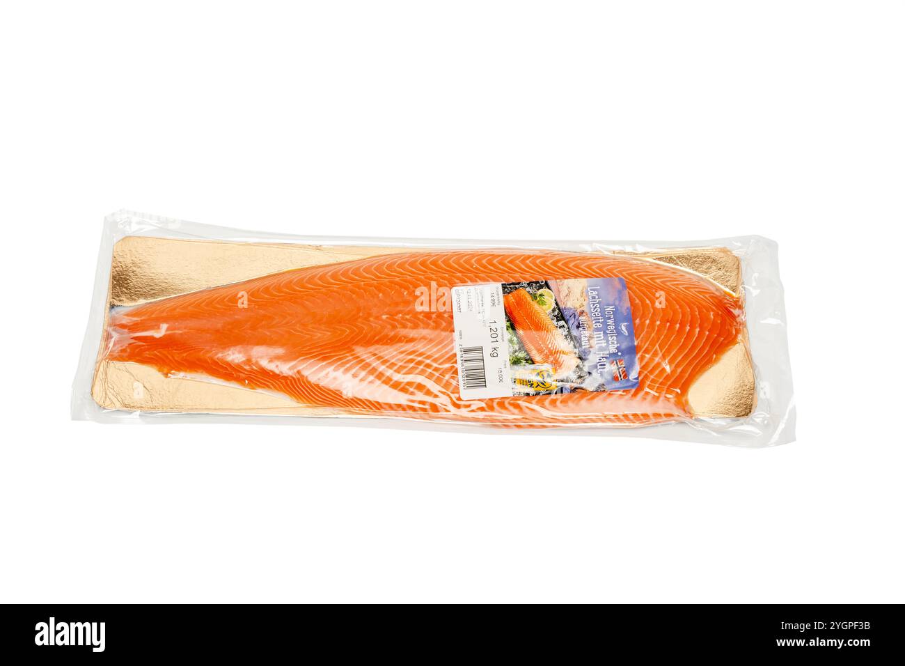 Germany Berlin November 8, 2024 Salmon fillet displayed in a plastic ...