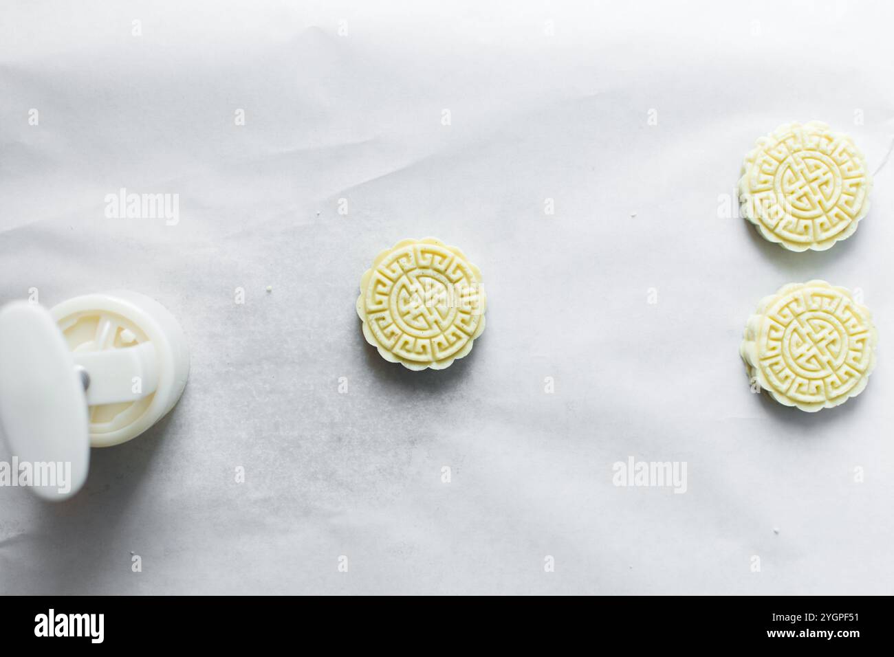 Overhead view of tuwon madara dough on parchment paper, nigerian alawar ...