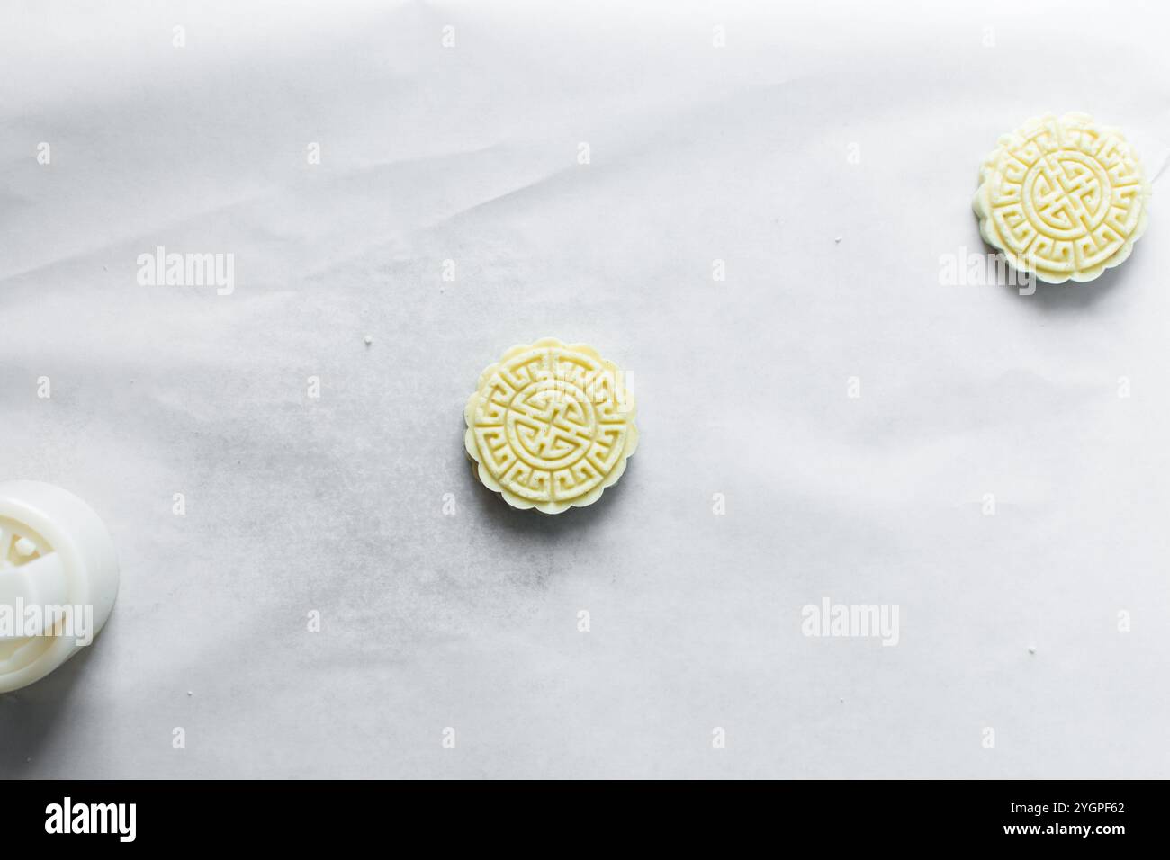Overhead view of tuwon madara dough on parchment paper, nigerian alawar ...