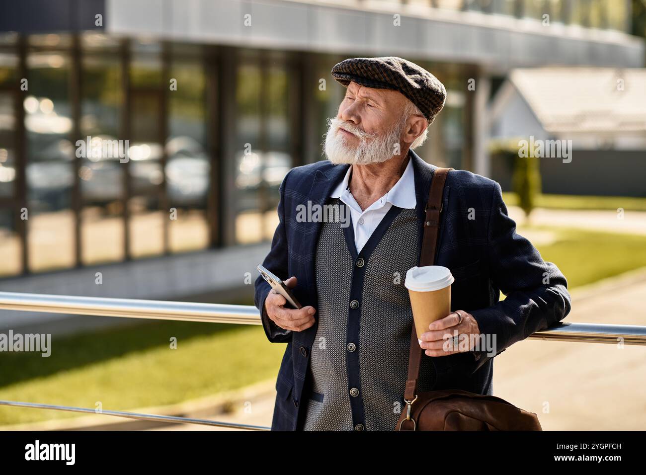 A distinguished older gentleman, dressed in smart casual attire, savors ...