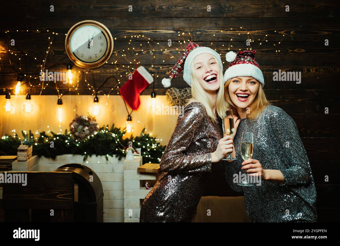 Christmas preparation. Luxury two girls celebrating New Year. Christmas ...