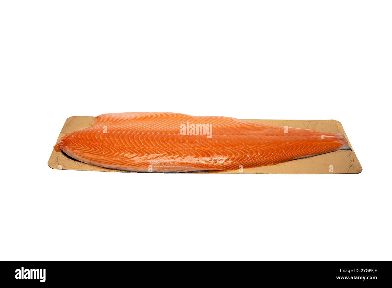 Salmon fillet on golden paper. Salmon is cut in half and is on a white ...