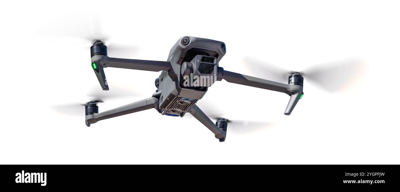 Front View of a Drone Quadcopter UAV In Flight Isolated on a White ...