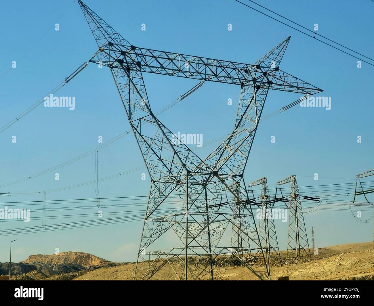 A transmission tower, electricity pylon which is a tall steel lattice structure that used to ...