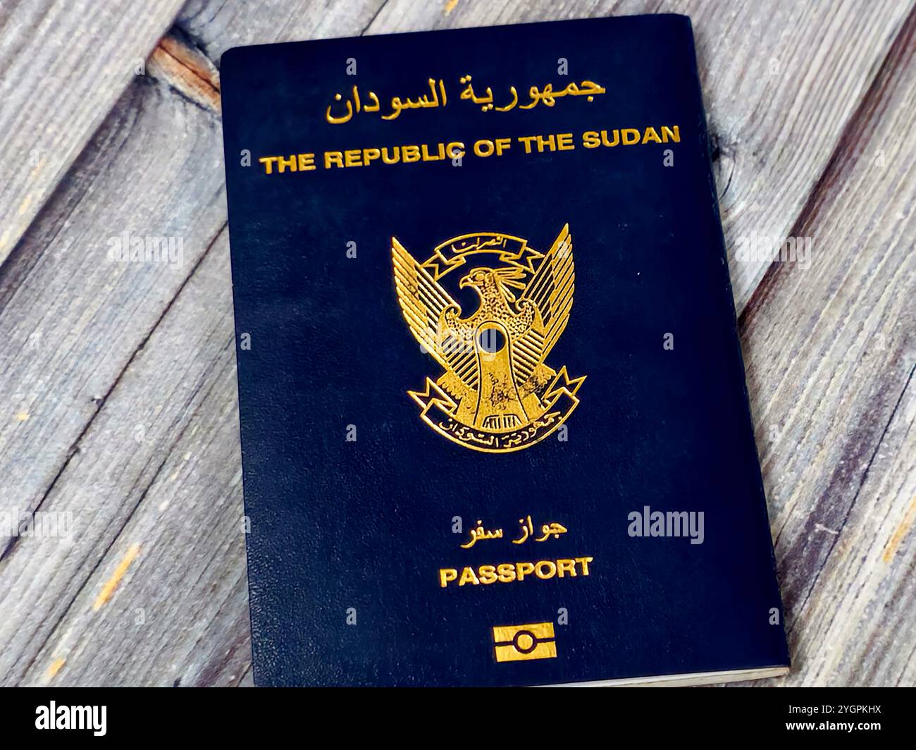 The Republic of Sudan passport with a gilded falcon in the center of ...