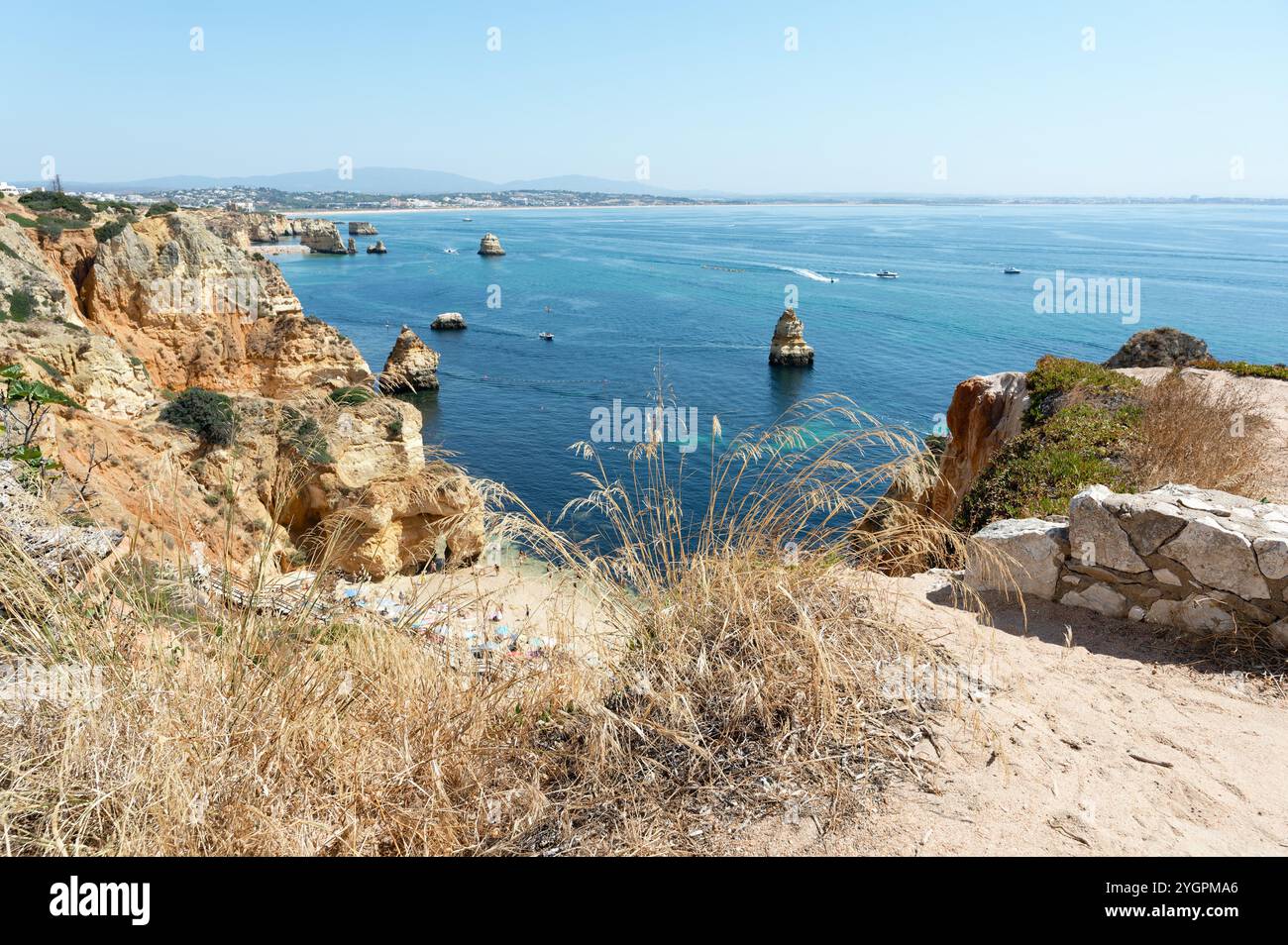 Stunning coastal cliffs overlooking the azure waters of Lagos Stock ...