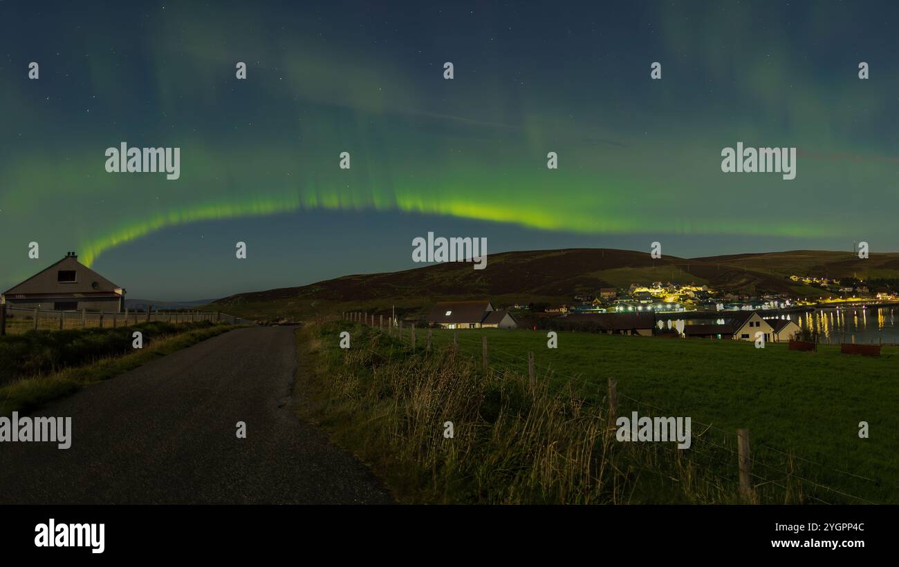 The Northern Lights over the town of Scalloway in the Shetland Islands ...
