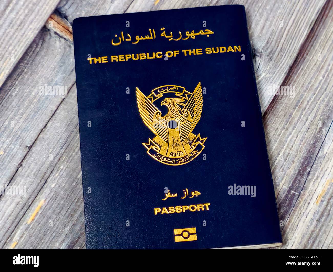 The Republic of Sudan passport with a gilded falcon in the center of ...
