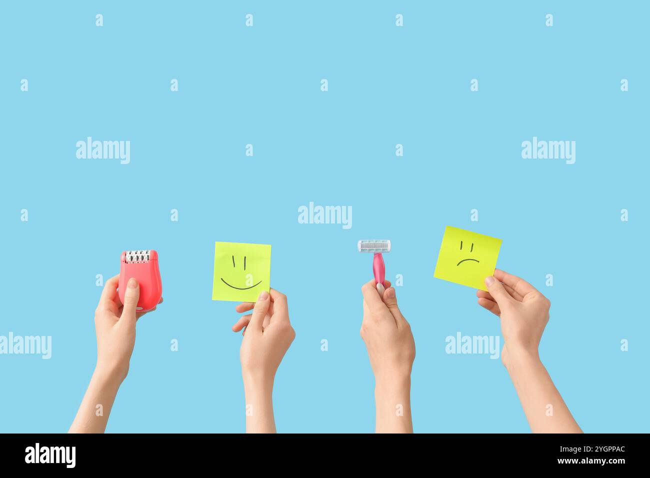 Female hands with modern epilator, razor and paper sticky notes with ...