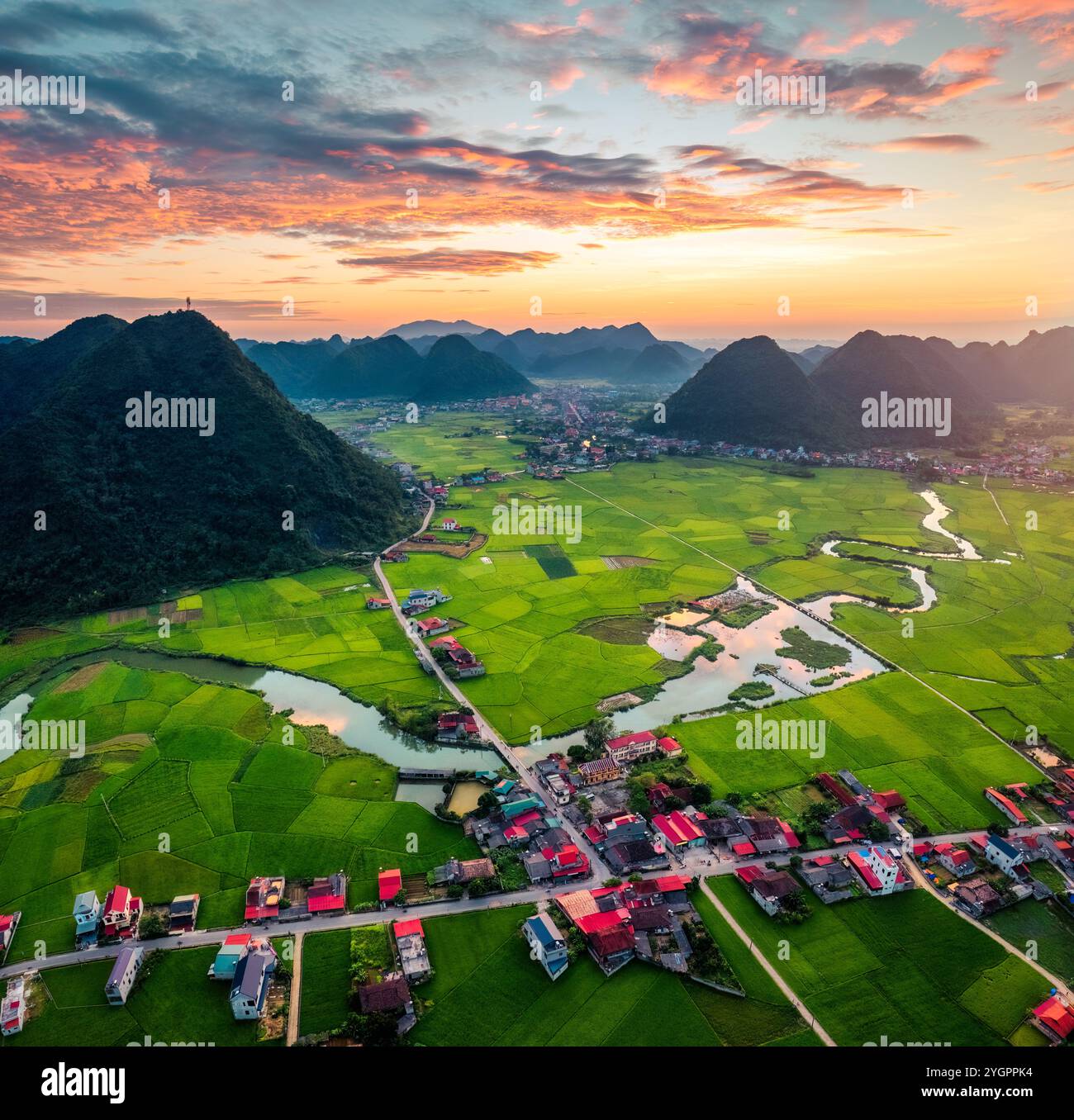 Aerial view of sunset sky over Bac Son Valley with mountain, Lush rice ...