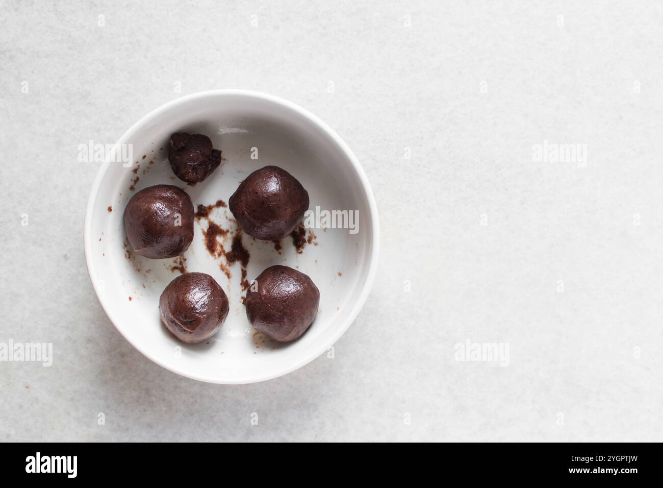 Overhead view of red bean paste balls in a white bowl, top view of ...