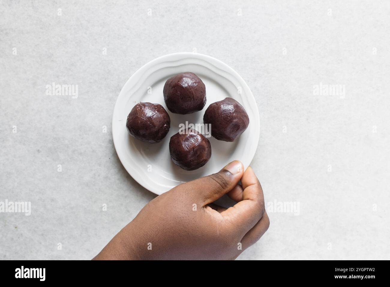 Overhead view of red bean paste balls in a white bowl, top view of ...