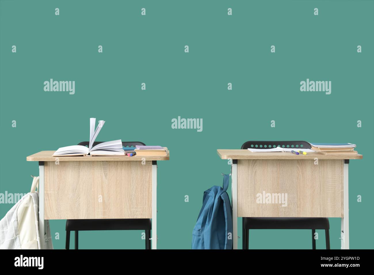 School desks stationery backpacks hi-res stock photography and images ...
