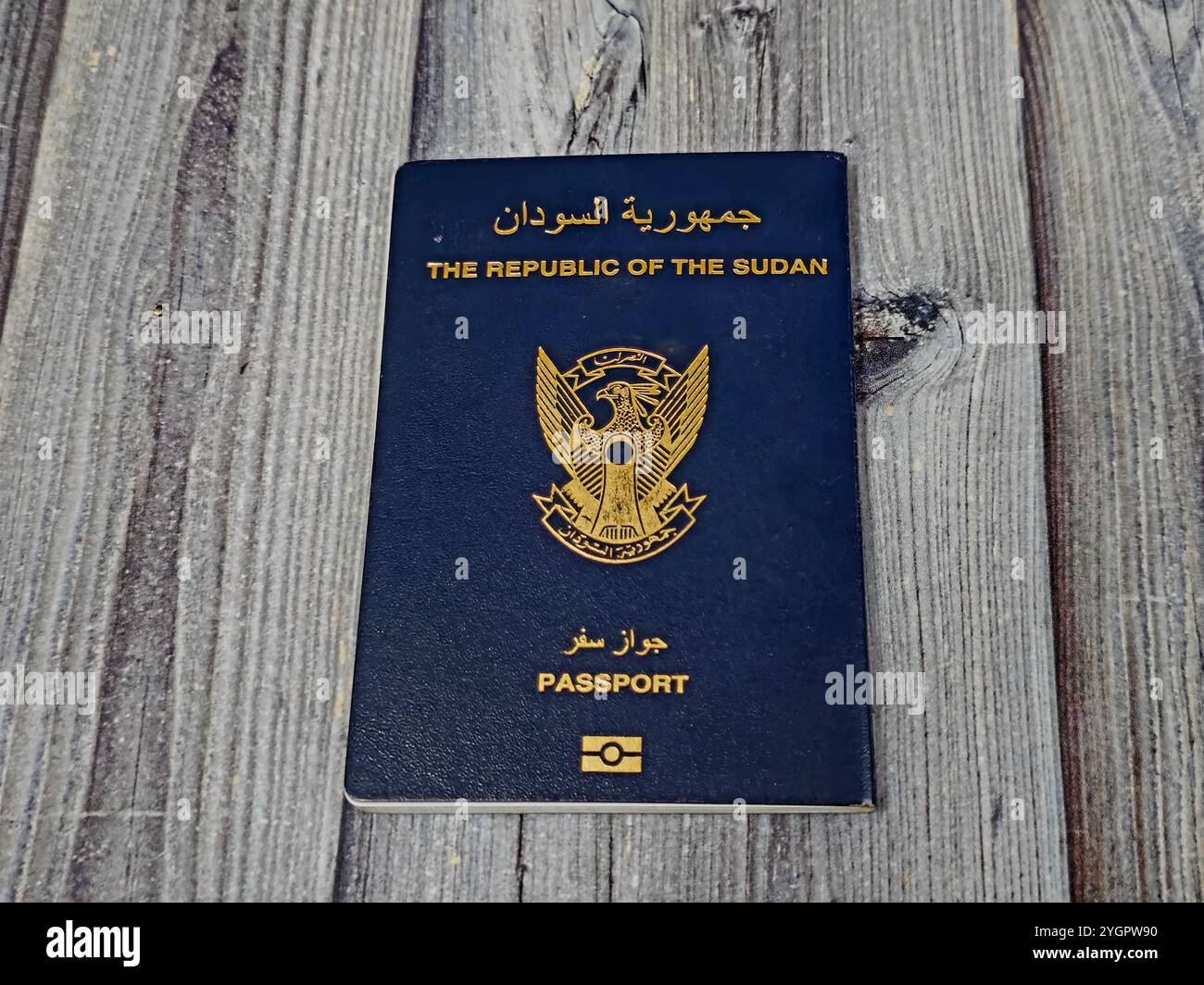 The Republic of Sudan passport with a gilded falcon in the center of ...