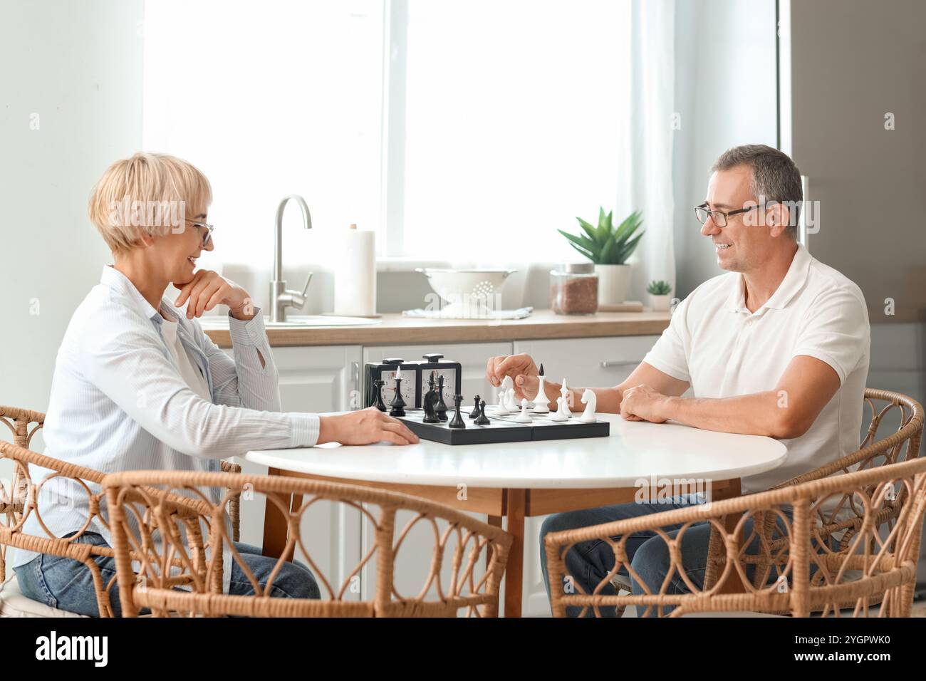 Together husband wife chess hi-res stock photography and images - Alamy