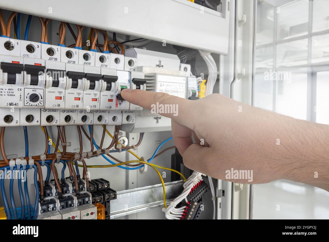 Hand Operating Switch in Electrical Circuit Panel Stock Photo - Alamy