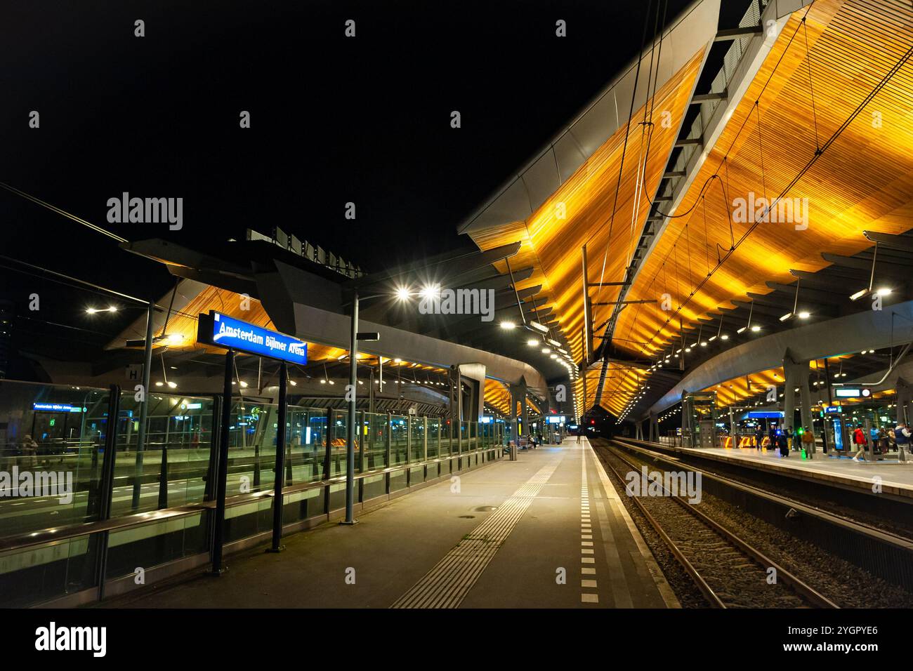 Converging platforms and railroad tracks at Amsterdam Bijlmer Arena ...