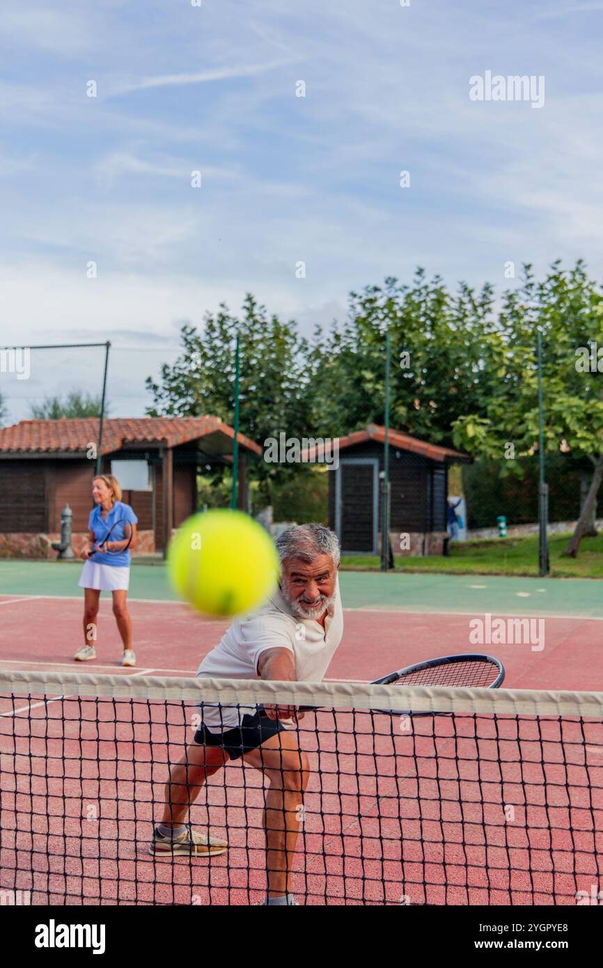 Tennis player captured in action hi-res stock photography and images ...