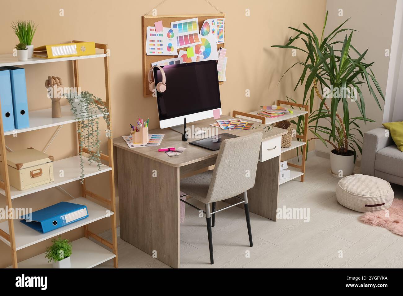Interior of designer's office with workplace and shelf units Stock ...