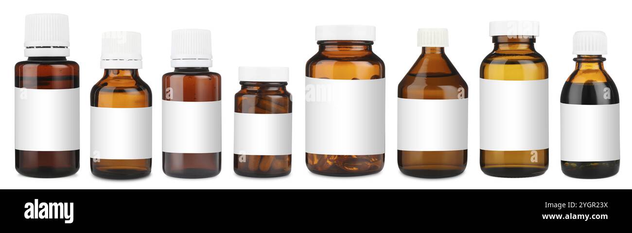 Many different glass bottles with labels isolated on white Stock Photo ...